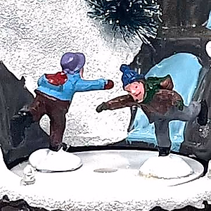 allgala Crafted Polyresin Christmas House Collectable Figurine with USB and Battery Dual Power Source-Moving Train and Skaters-XH93445