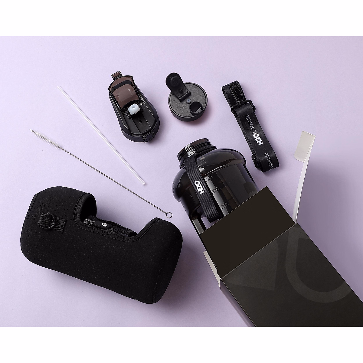 H2O Capsule 2.2L Half Gallon Water Bottle with Storage Sleeve and Covered Straw Lid – BPA Free Large Reusable Drink Container with Handle - Big Sports Jug, 2.2 Liter (74 Ounce) Jet Black