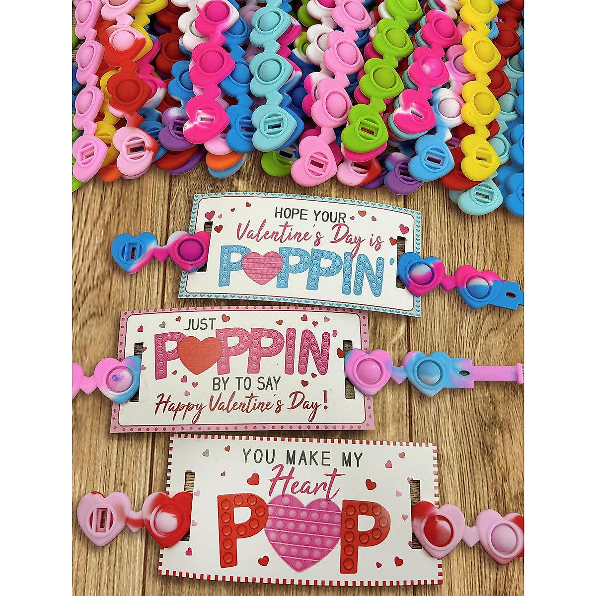 Valentines Day Gifts for Kids - 24 Pack Valentines Cards with Heart POP Bracelets - Sensory Fidget Toys Valentine for School Classroom Gift Exchange Party Favors Supplies for Toddlers Girls Boys