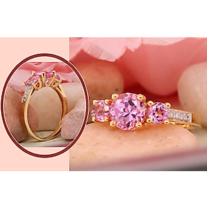 Dazzlingrock Collection 7 MM Centre & 4 MM Side Round Lab Created Pink Sapphire with Natural White Diamond Women Three Stone Engagement Ring | 10K Yellow Gold, Size 7