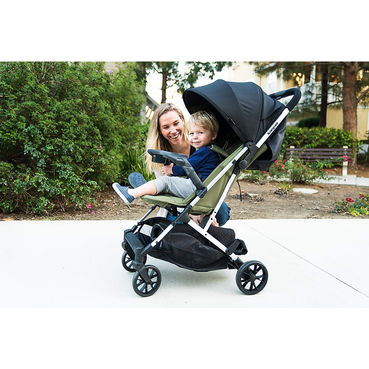 Joovy Kooper Lightweight Baby Stroller Featuring Removable, Swing-Open Tray, Big Wheels, Reclining Seat with Footrest, Extra-Large Retractable Canopy, and Compact Fold (Olive)