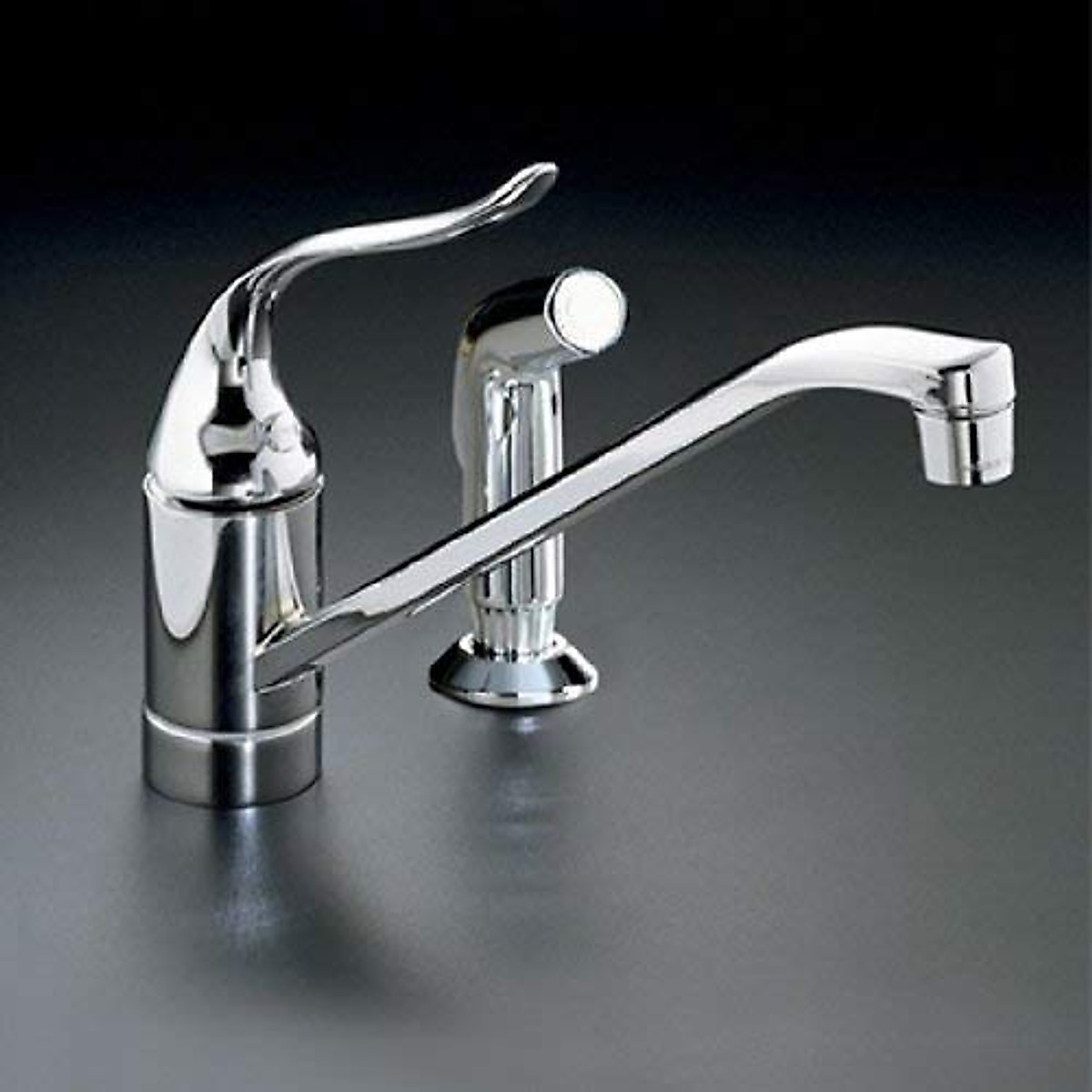 KOHLER Coralais(R) two-hole kitchen sink faucet with 10" spout, matching finish sidespray, ground joints and lever handle, less escutcheon