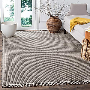 SAFAVIEH Montauk Collection Area Rug - 5' x 8', Ivory & Black, Handmade Flat Weave Boho Farmhouse Cotton Tassel Fringe, Ideal for High Traffic Areas in Living Room, Bedroom (MTK340D)