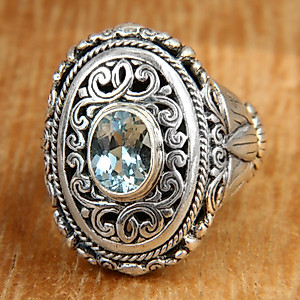 NOVICA Artisan Handmade Blue Topaz Cocktail Ring 1.5 Carat Sterling Silver Single Stone Indonesia Serenity Airy Birthstone [crownbezel 1 in L x 0.7 in W x 0.4 in D Band Width 4 mm W] ' Island Blue'