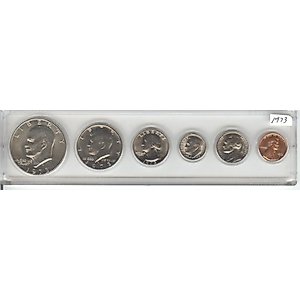 1973 BIRTH YEAR COIN SET- 6 COINS- EISENHOWER DOLLAR, KENNEDY HALF DOLLAR, QUARTER, DIME, NICKEL, AND CENT- ALL DATED 1973 AND DISPLAYED IN A HARD PLASTIC CASE- COINS ARE UNCIRCULATED