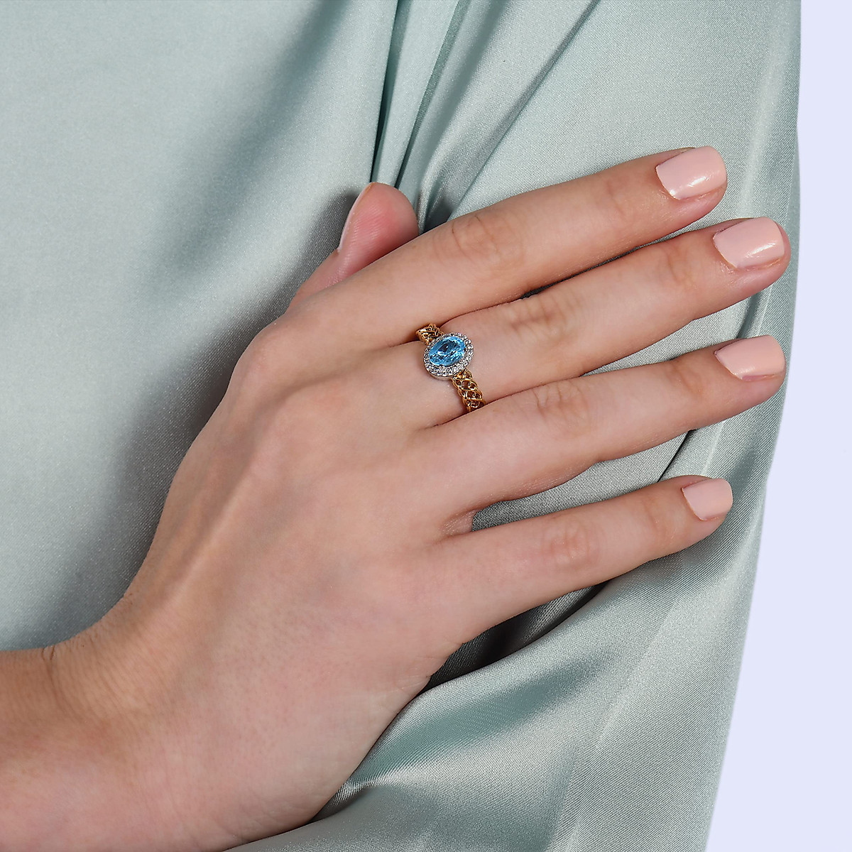 Jewelili Enchanted Disney Fine Jewelry Sterling Silver and 10K Yellow Gold with 1/10 CTTW Diamond and Swiss Blue Topaz Brave 10th Anniversary Collectors Merida Halo Ring