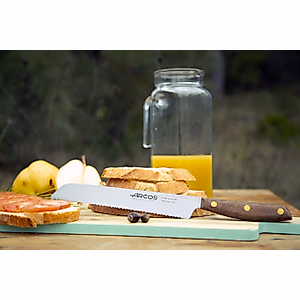 ARCOS Bread Knife 8 Inch Nitrum Stainless Steel and 200 mm blade. Obtain a great variety of cuts for your food. Ideal knife for daily domestic use. Series Nordika. Color Brown.