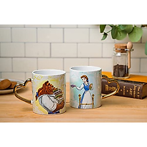 Silver Buffalo Disney Princess Beauty and the Beast Don't Mind the Books Gold Heart Shaped Handle 2 Pack Ceramic Mug Set, 14 Ounces