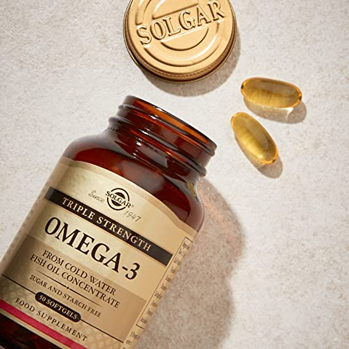 Solgar Triple Strength Omega-3 950 mg, 100 Softgels - Supports Cardiovascular, Joint & Skin Health - Heart Healthy Supplement - Essential Fatty Acids - Non GMO, Gluten/ Dairy Free - 100 Servings