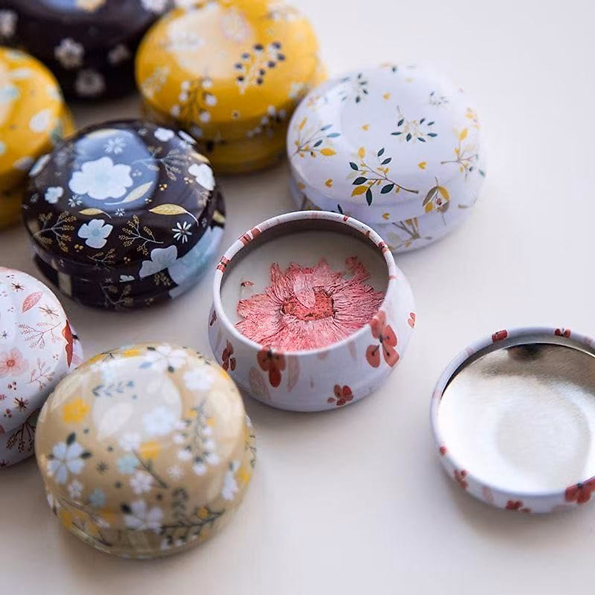 Rarapop 12 Pack Reusable Mini Round Tinplate Candle Tin Jars with Lids, 20ml Small Flower Travel Tin Cans Refillable Empty Container Bottle for Lip Balm, Salve, Eye Shadow, Powder