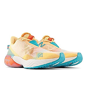 New Balance Women's FuelCell Rebel TR V1 Running Shoe, Solar Flare/White, 7.5 Wide