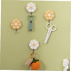 Parliky 4Pcs Decorative Daisy Adhesive Wall Hooks Strongly Adhesive Punch Hangers for Clothes Hats Towels Cute Wall Mounts for Home Decor