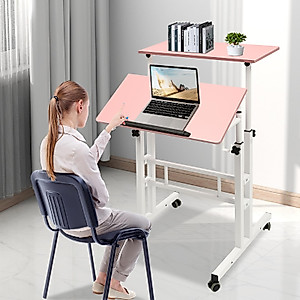LEYSRIS Mobile Standing Desk Stand up Computer Desk Workstation with Universal Wheels, Adjustable Height Dual Desktop Tilting Panel Rolling Computer Cart with 2 USB Interfaces and 2 Sockets (Pink)