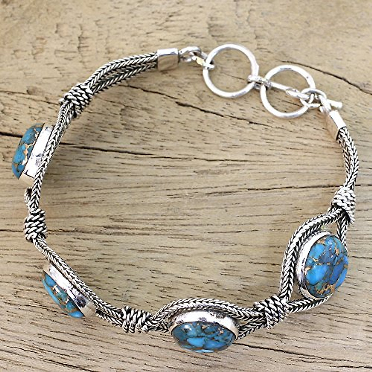 NOVICA Handmade .925 Sterling Silver Link Bracelet Composite Turquoise Reconstituted Blue India Island Paradise Gemstone [7 in min L x 7.5 in max L x 0.7 in W] 'Heavenly Blues'
