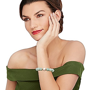 Ross-Simons 11-12mm Cultured Pearl and 12mm Carved Jade Dragon Bead Stretch Bracelet With 14kt Yellow Gold. 7 inches