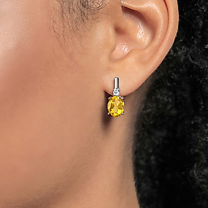 Gem Stone King 925 Sterling Silver Yellow Citrine and White Topaz Earrings For Women (2.46 Cttw, Gemstone November Birthstone, Oval 9X7MM)
