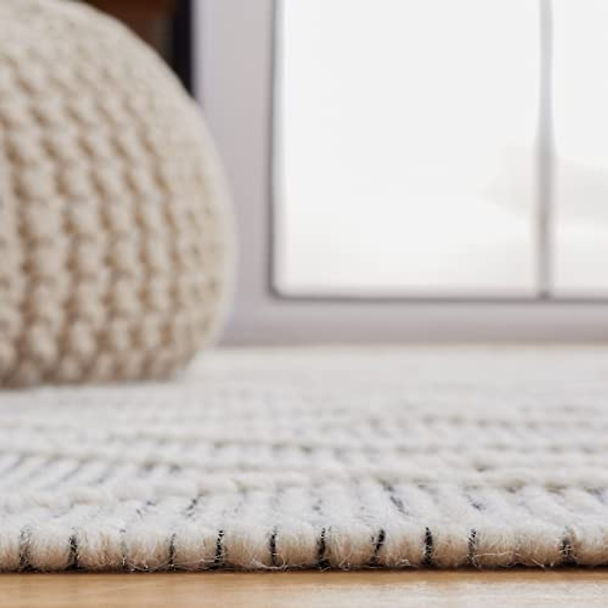 Safavieh Natura Collection Accent Rug - 4' x 6', Ivory & Black, Handmade Boho Geometric Braided Tassel Wool, Ideal for High Traffic Areas in Entryway, Living Room, Bedroom (NAT323A)