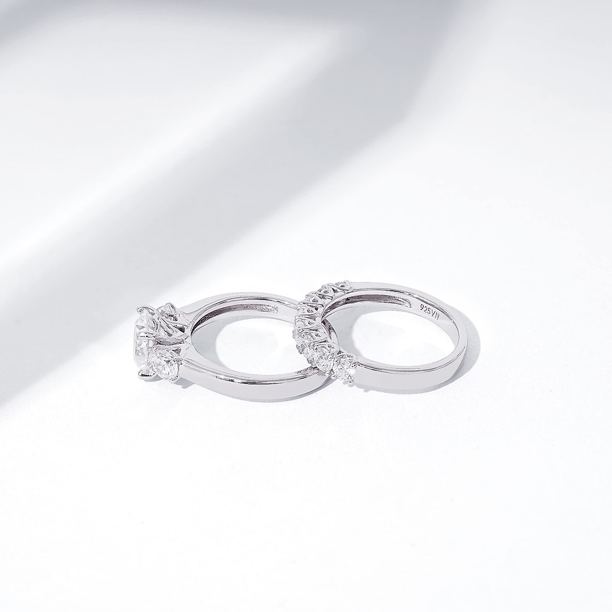 Amazon Essentials Sterling Silver Platinum Plated Infinite Elements Cubic Zirconia Three Stone Ring, Size 7 (previously Amazon Collection)