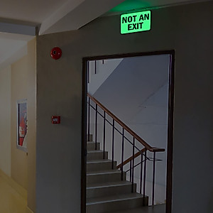 SmartSign Not an Exit Label | 7" x 10" Glow-in-The-Dark Laminated Vinyl Sticker, Made in USA