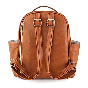 Itzy Ritzy Mini Diaper Bag Backpack - Chic Mini Diaper Bag Backpack with Vegan Leather Changing Pad, 8 Total Pockets (4 Internal and 4 External), Grab-Top Handle and Rubber Feet, Cognac