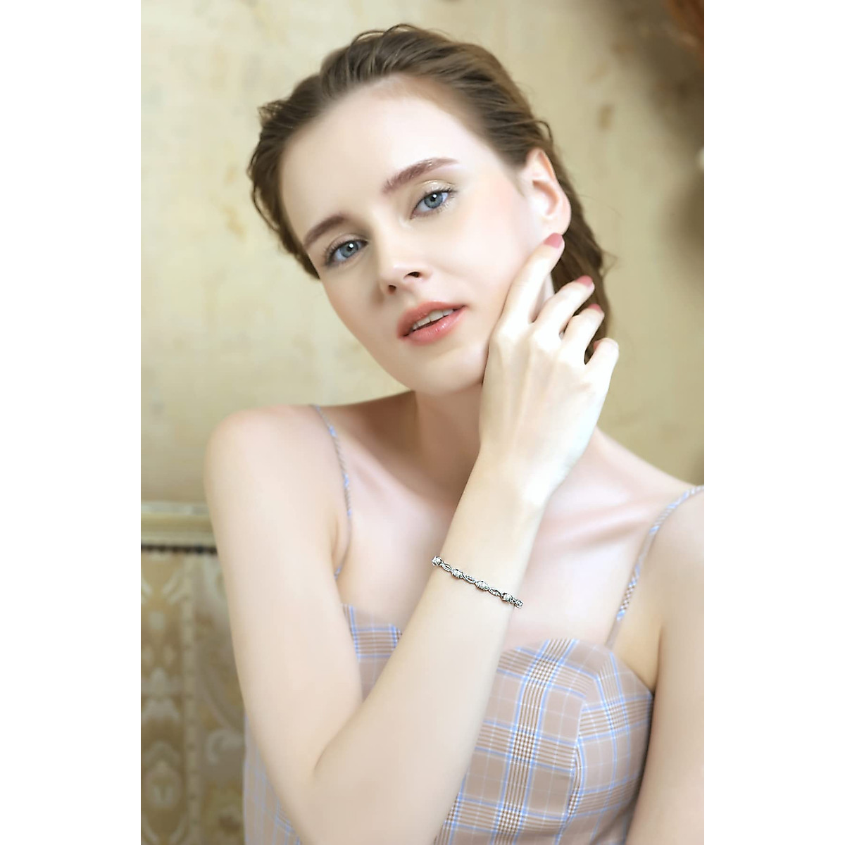 B. BRILLIANT Sterling Silver Aquamarine and White Topaz Oval-Cut Swirl Tennis Bracelet