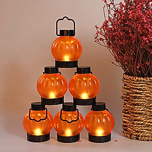 IMAGE Flickering Pumpkin Lantern Tea Lights 12 Pack Flickering LED Pumpkin Lights with Battery Operated Flameless Pumpkin Tealight Candles for Halloween, Christmas, Thanksgiving and Theme Parties