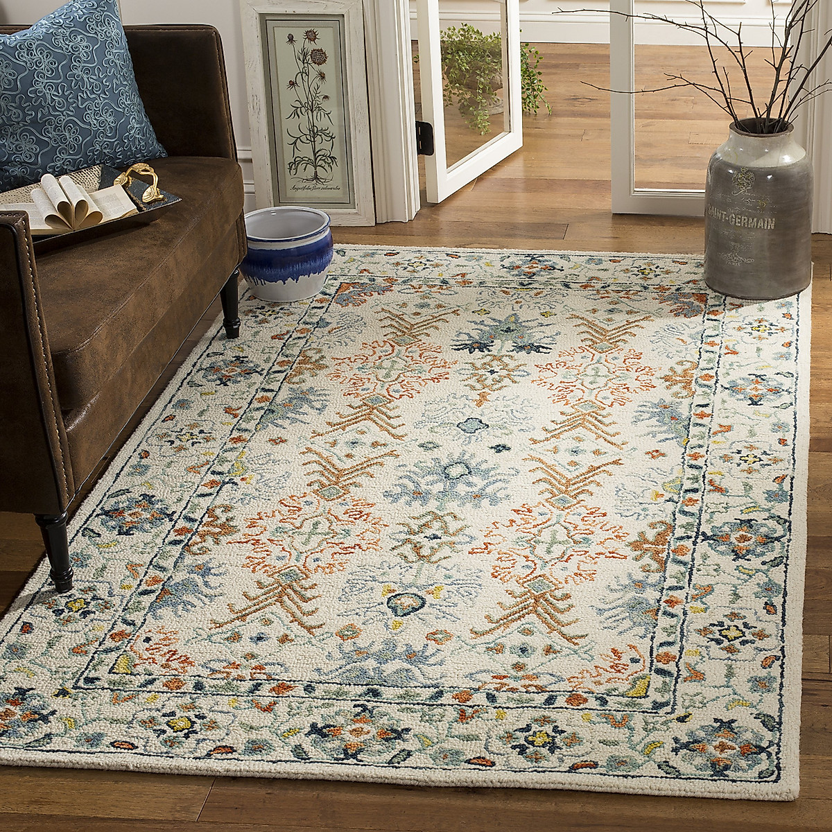 SAFAVIEH Aspen Collection Area Rug - 6' x 9', Ivory & Blue, Handmade Boho Wool, Ideal for High Traffic Areas in Living Room, Bedroom (APN310A)