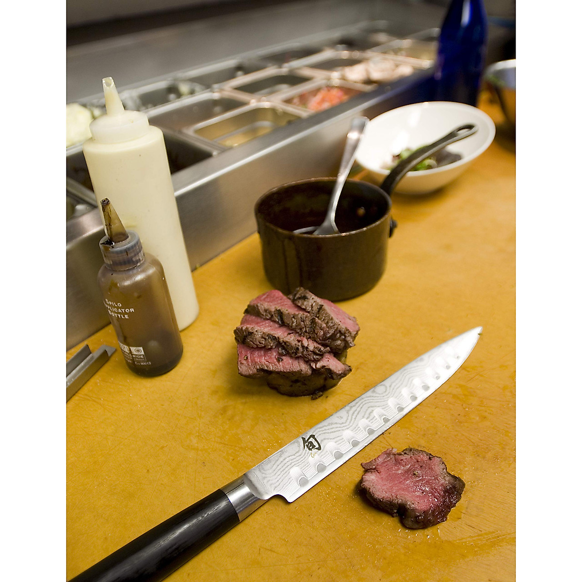 Shun Classic 9" Hollow Ground Slicing Knife, Handcrafted Japanese Meat Slicing Knife, Long and Thin Blade, VG-MAX Core with Damascus Stainless Steel Cladding, Pakkawood Handle