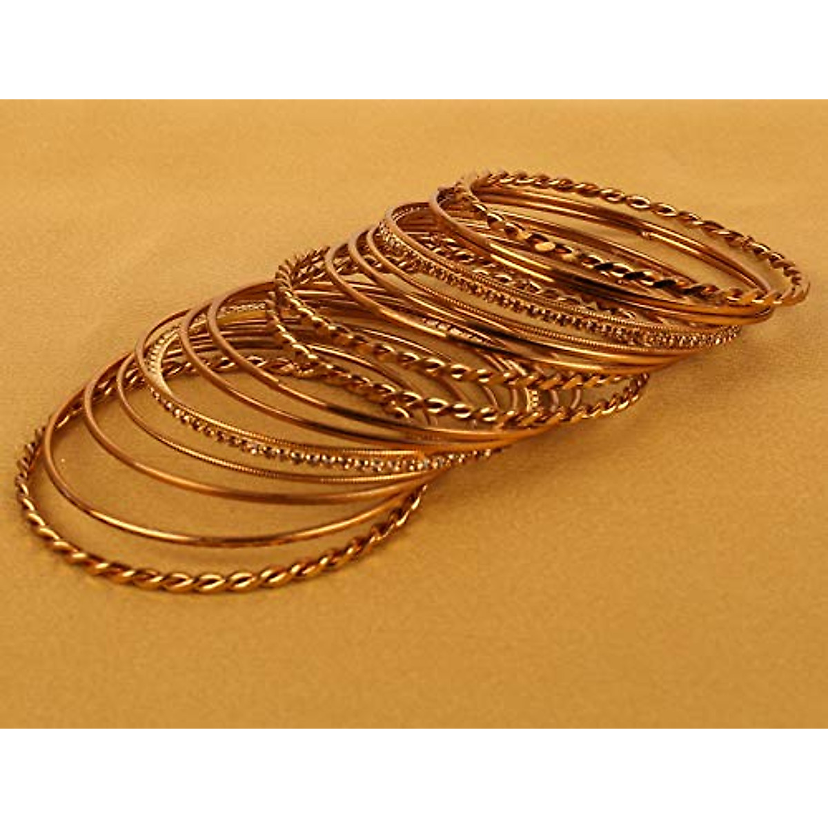 Touchstone New Golden Bangle Collection Indian Bollywood Clear Rhinestone and Zigzag Designer Jewelry Bangle Bracelets. Set of 18 in Antique Gold Tone for Women.