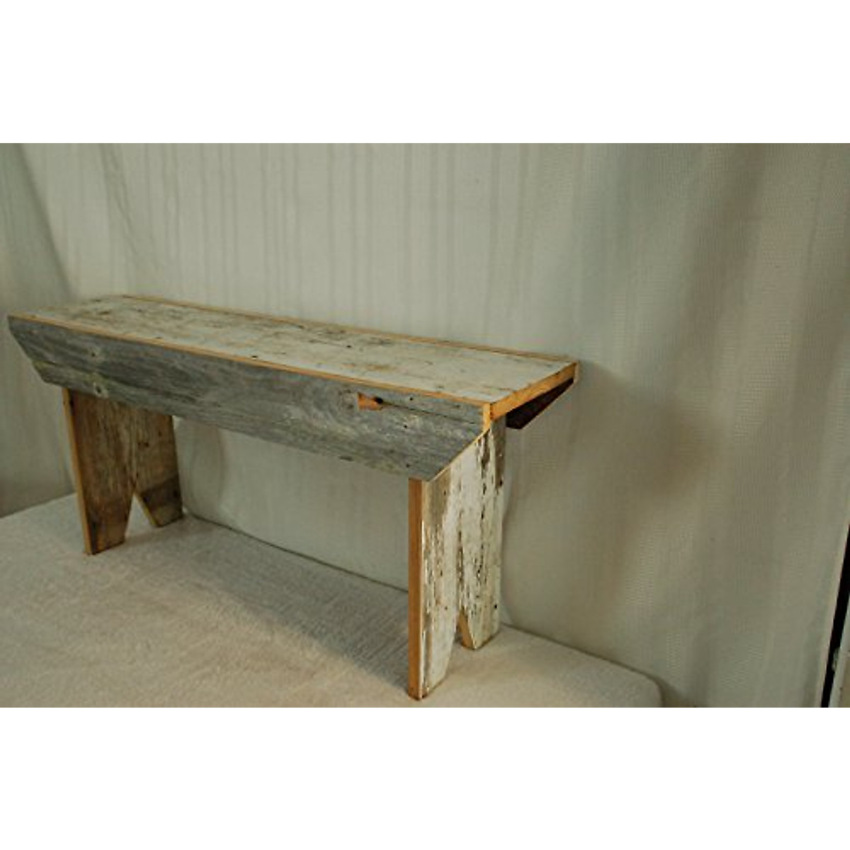 Rustic 3 Foot Barnwood Bench. This Country Bench Seats Varies in Width From 8 - 10" and Stands 16" Off Ground. Made From Antique Barnwood in Excess of 100 Years Old. This Rustic Primitive Bench Is a Great Addition to Your Home and Garden Landscape Design.