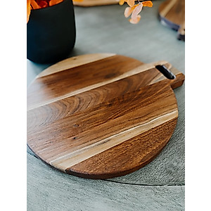 Round charcuterie serving board with handle, handmade in the USA with Walnut hardwood.