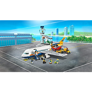 LEGO City Passenger Airplane 60262, with Radar Tower, Airport Truck with a Car Elevator, Red Convertible, 4 Passenger and 4 Airport Staff Minifigures, Plus a Baby Figure (669 Pieces)