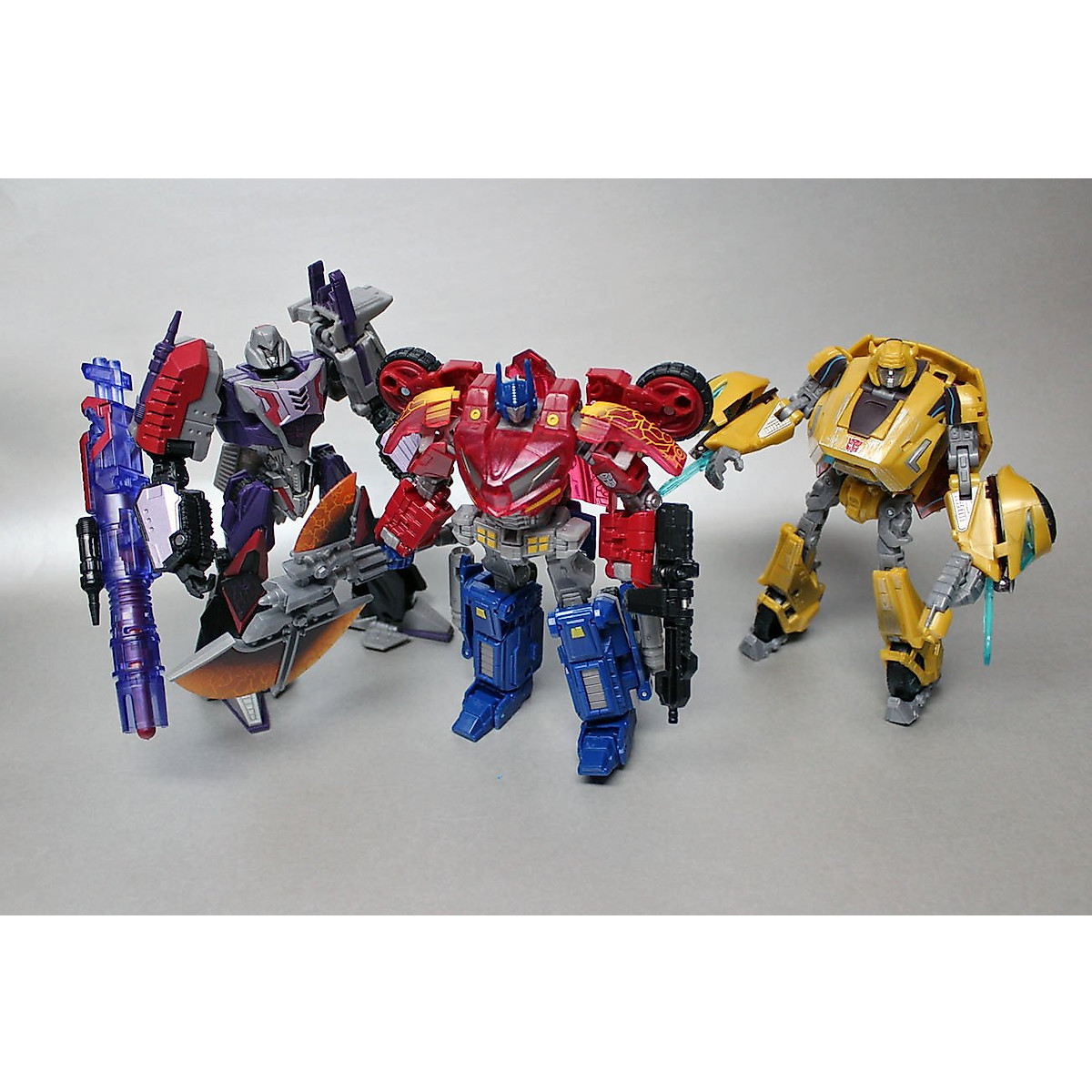 Transformers Generations Rage Over Cybertron. Deluxe Cybertronian Optimus Prime, Deluxe Cybertronian Bumblebee, & Deluxe Cybertronian Megatron