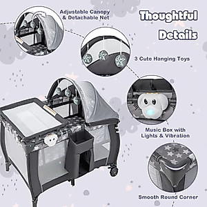 HONEY JOY Pack and Play with Bassinet, 4-in-1 Portable Baby Playard with Changing Table, Net & Cute Toys, Diaper Storage Bag, Music Box, Wheels with Brake, Foldable Newborn Play Yard w/Carry Bag