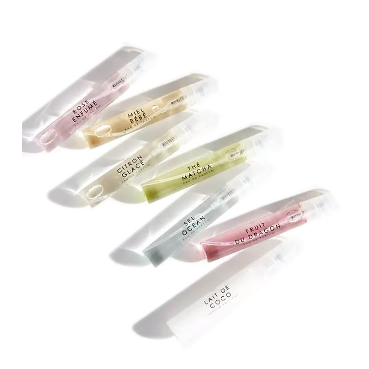 Gourmand Eau De Parfum Le Jet Set! 7 Scents Citron Glace, Fruit du Dragon, Lait de Coco, Miel Bebe, Rose Enfume, Sel Ocean & Matcha! Assorted Mini Fragrance Spray Gift Set! Vegan and cruelty Free!