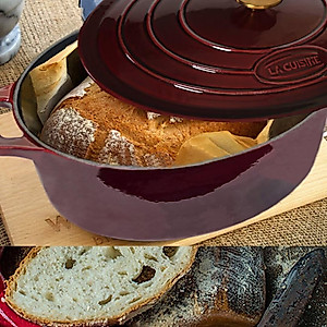 La Cuisine Enameled Cast Iron Oval Dutch Oven Casserole Dish Pot with Lid 6.75 QT Internal Matte Black Enamel Coating for bread baking, Gold-Plated Stainless Steel Lid Handle, Oven Safe up to 500° F. Cranberry