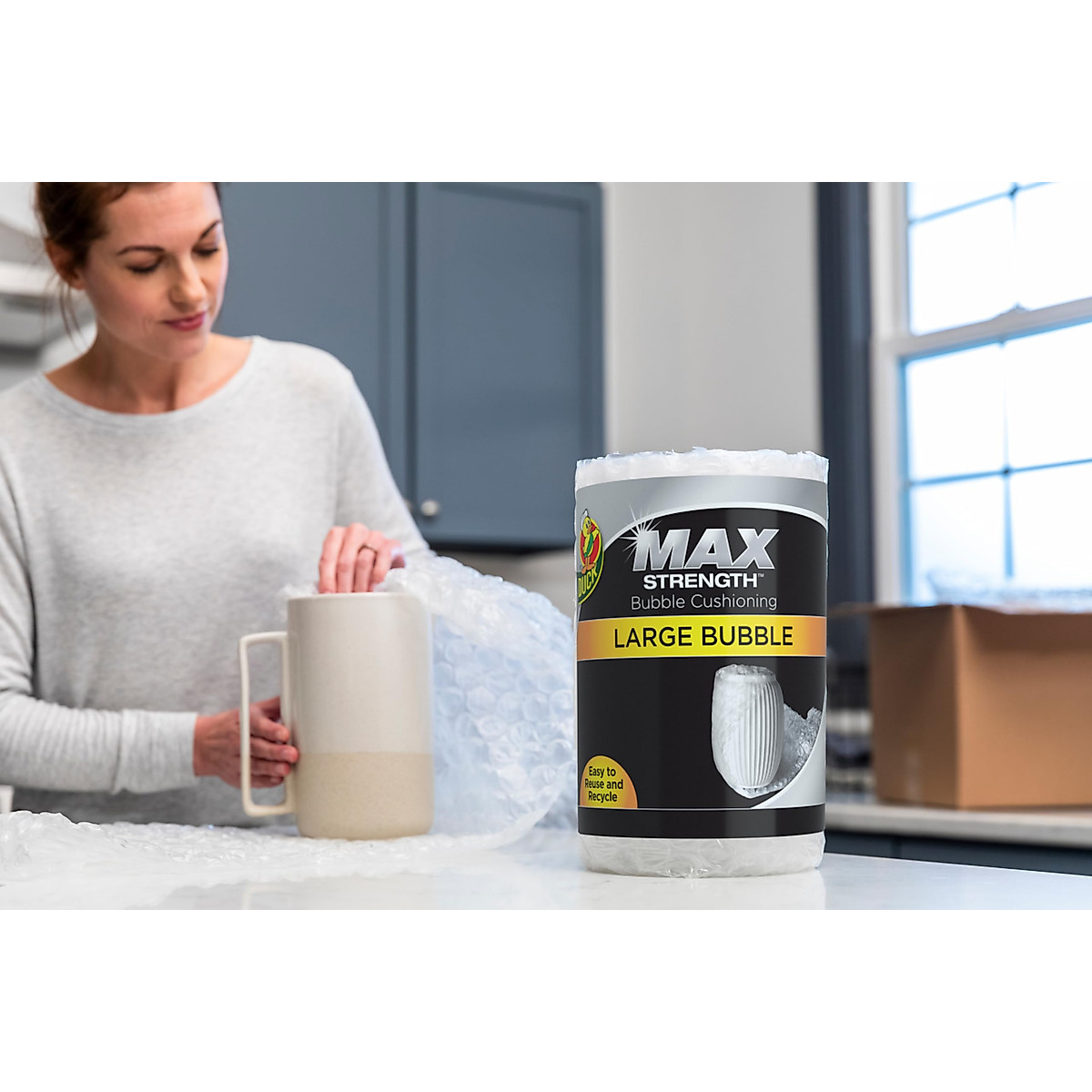 Duck Max Strength Bubble Cushioning Wrap for Moving & Shipping, 60 FT Large Bubble Packing Wrap, Heavy Duty Protection for Mailing & Packaging Boxes, Clear Bubble Roll Supplies Perforated Every 12 IN