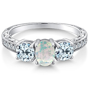 Gem Stone King 925 Sterling Silver White Simulated Opal and Sky Blue Topaz Ring For Women (1.75 Cttw, Oval Gemstone Birthstone, Available In Size 5, 6, 7, 8, 9)