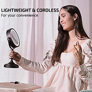OVENTE 7'' Lighted Makeup Mirror with 1X/7X Magnification, Cordless Tabletop Mount Vanity Mirror with 360° Swivel Design & Double Sided Glow Cosmetic White LED Ring Light, Antique Bronze MCT70ABZ1X7X