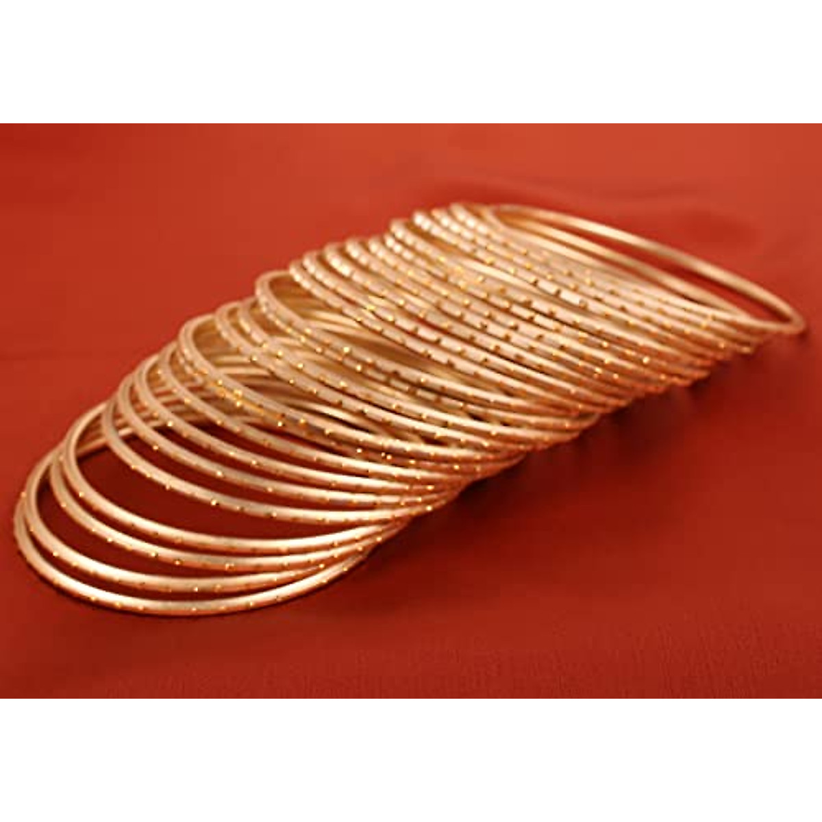 Touchstone New Colorful 2 Dozen Bangle Collection Indian Bollywood Alloy Metal Textured Light Golden Designer Jewelry Special Large Size Bangle Bracelets Set of 24 in Antique Gold Tone for Women
