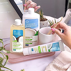 Desert Essence Coconut Oil Dual Phase Pulling Rinse, Mint, 8 fl oz - Alcohol Free, Sugar Free, Gluten Free, Vegan, Non-GMO - Organic Virgin Coconut Oil, Sesame Oil, Sunflower Oil & Tea Tree Oil