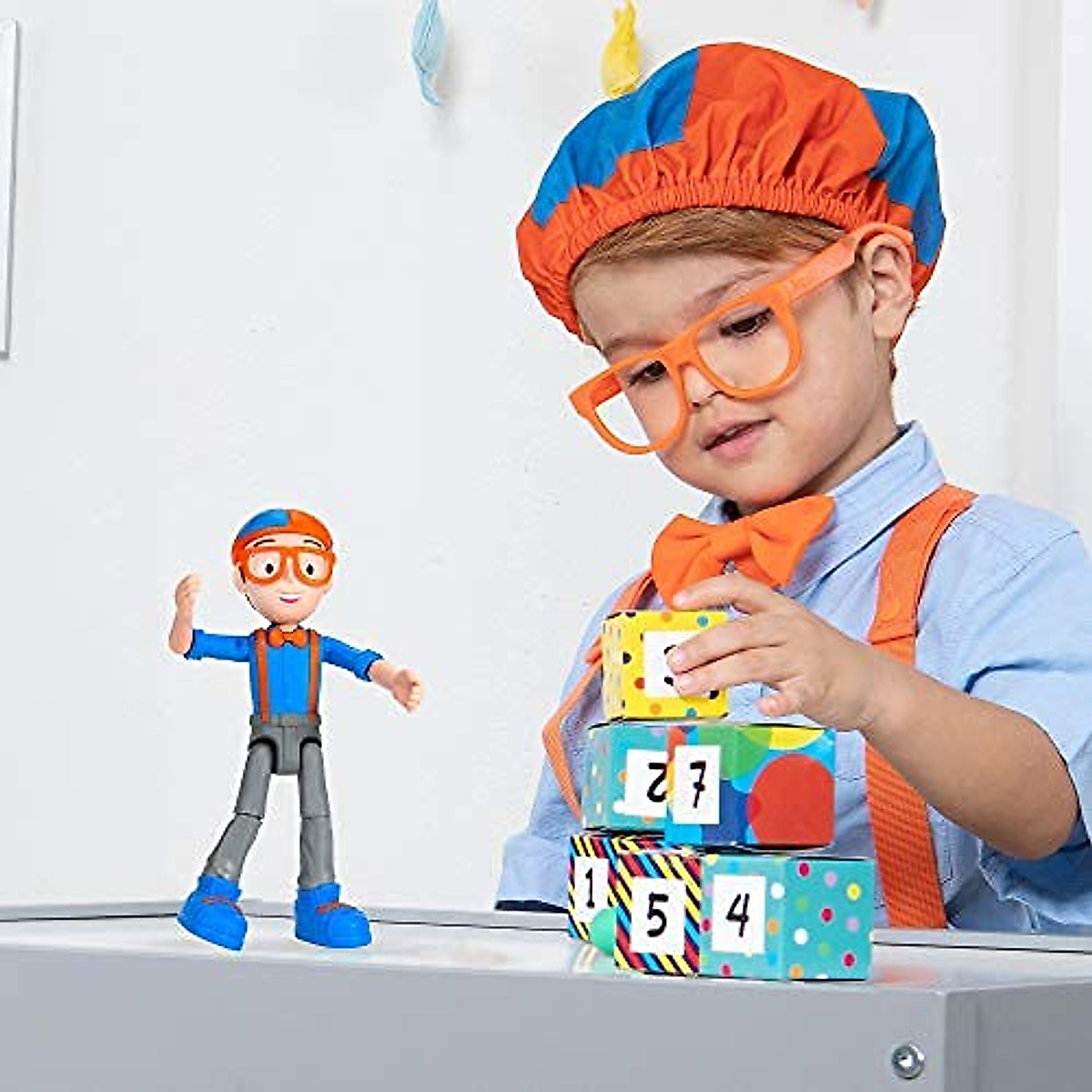 Blippi Talking Figure, 9-inch Articulated Toy with 8 Sounds and Phrases, Poseable Figure Inspired by Popular YouTube Edutainer