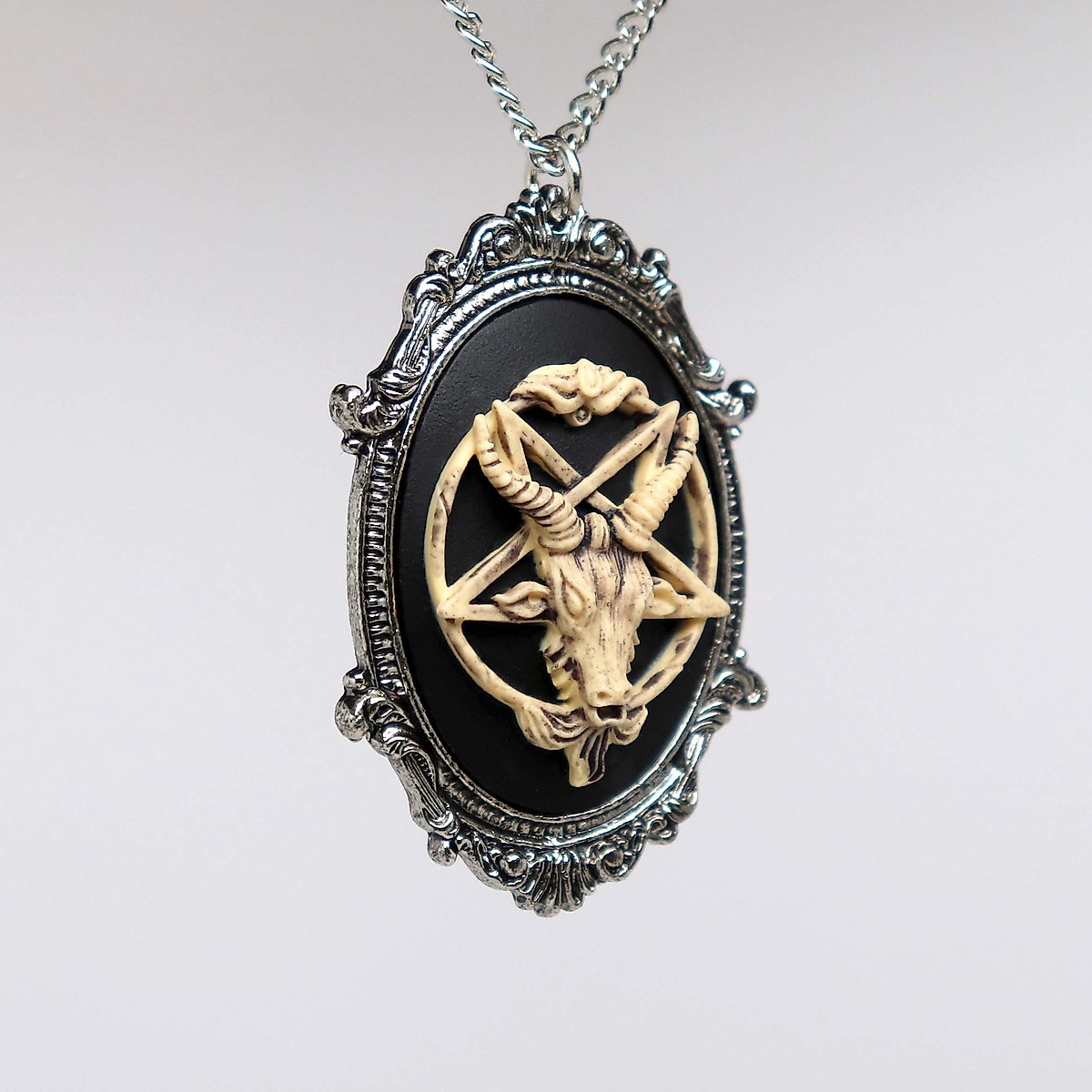 Antiqued Goat Head Satanic Baphomet Cameo Bone on Black In Silver Finish Frame Pendant Necklace