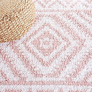 Safavieh Augustine Collection Area Rug - 5' x 7'7", Ivory & Pink, Moroccan Boho Tribal Fringe Design, Non-Shedding & Easy Care, Ideal for High Traffic Areas in Living Room, Bedroom (AGT849U)