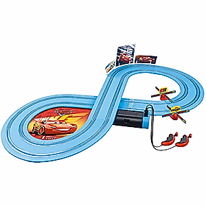 Carrera First Disney/Pixar Cars - Slot Car Race Track - Includes 2 Cars: Lightning McQueen and Dinoco Cruz - Battery-Powered Beginner Racing Set for Kids Ages 3 Years and Up