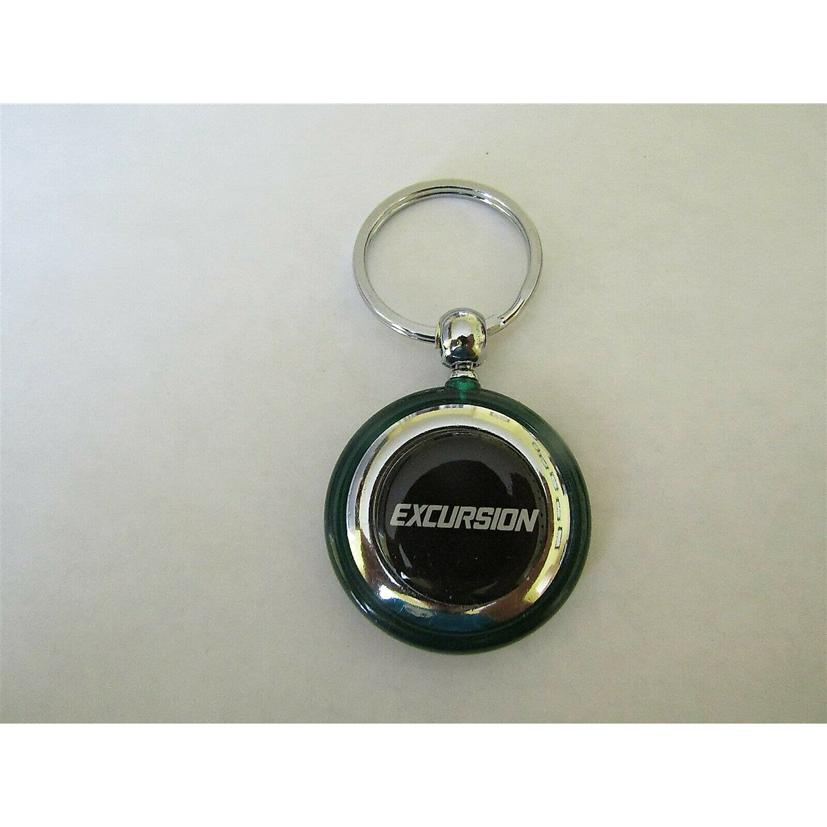 2000 2001 2002 2003 2004 2005 EXCURSION LOGO ROUND PLASTIC KEYCHAIN - GREEN