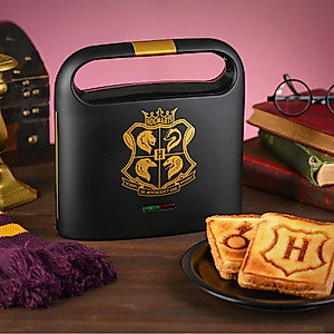 Warner Brothers Harry Potter Dual Sandwich Maker by Select Brands - Ceramic Coated Cooking Plates - Imprints Hogwarts Crest and Harry Potter Glasses on Toasted Sandwiches, Black and Gold, WBH-100SM