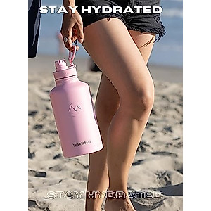 THERMOSIS 64 Oz Water Bottle With Straw, Half Gallon Water Bottle Thermos With Wide Mouth Opening and 2Lids. Includes Sports Water Bottle Holder With Strap (1/2 Gallon Water Jug) - Pink Water Bottle