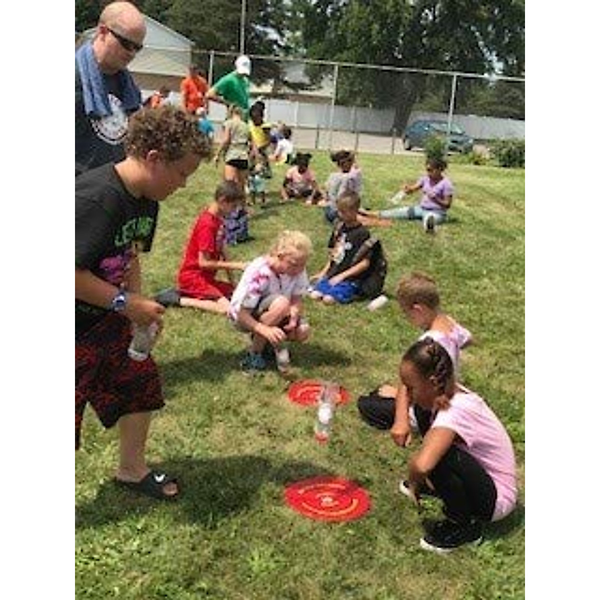 BOTTLE-BULLSEYE™ Game. Official Game Kit. Fun Family Game. Play Indoors or Outdoors. Made in The USA. Great for Family Game Night, Parties, picnics, Camping, Tailgating. Durable Target & Bottles!