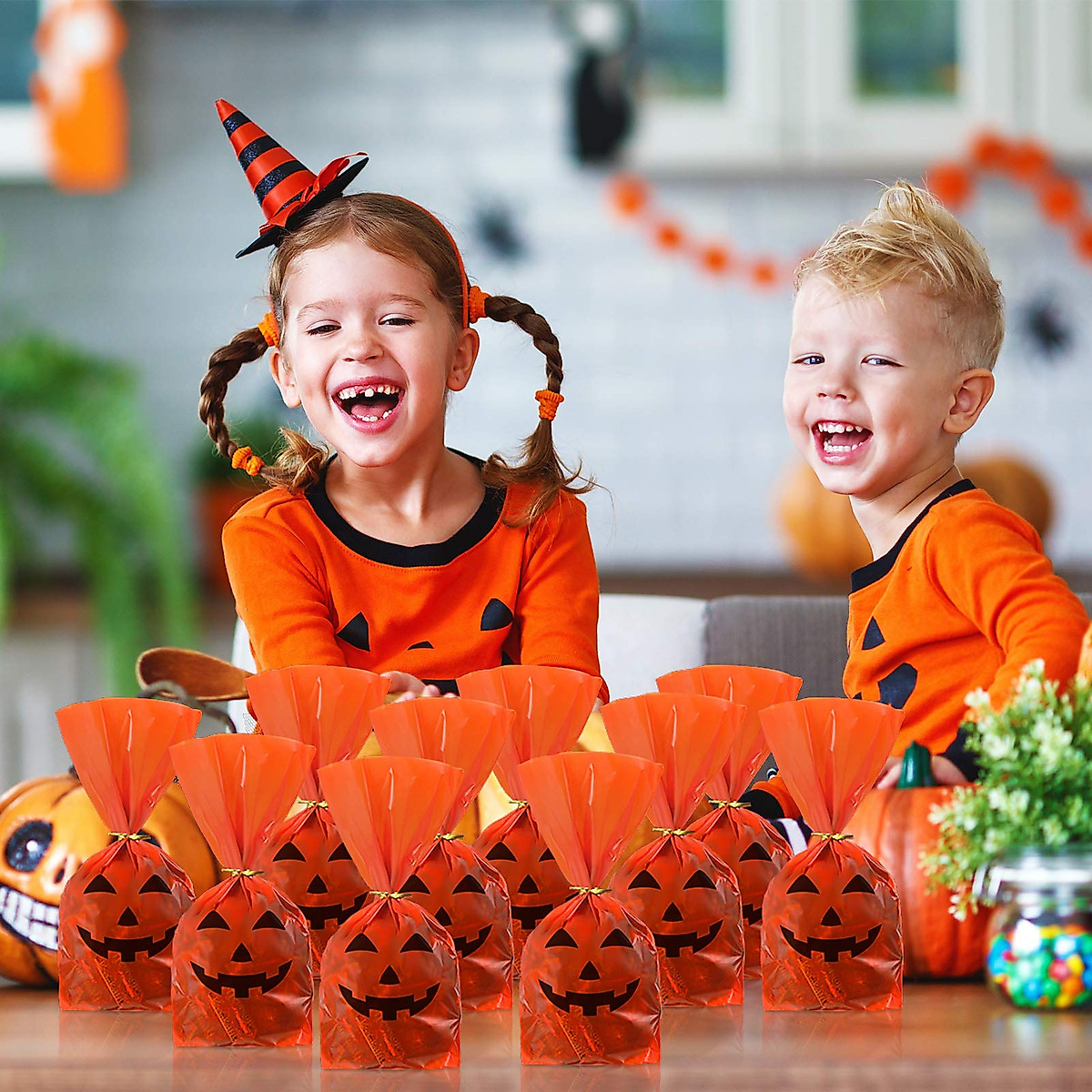 50 Pieces Halloween Favor Bags Pumpkin Smile Pattern Flat Cellophane Treat Bags Halloween Plastic Party Bags for Bakery, Popcorn, Cookies, Candies and Dessert with 100 Pieces Gold Twist Ties
